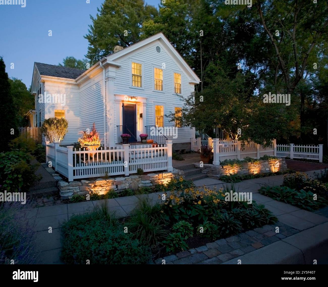 Exterior of beautiful greek revival house and front yard photographed ...