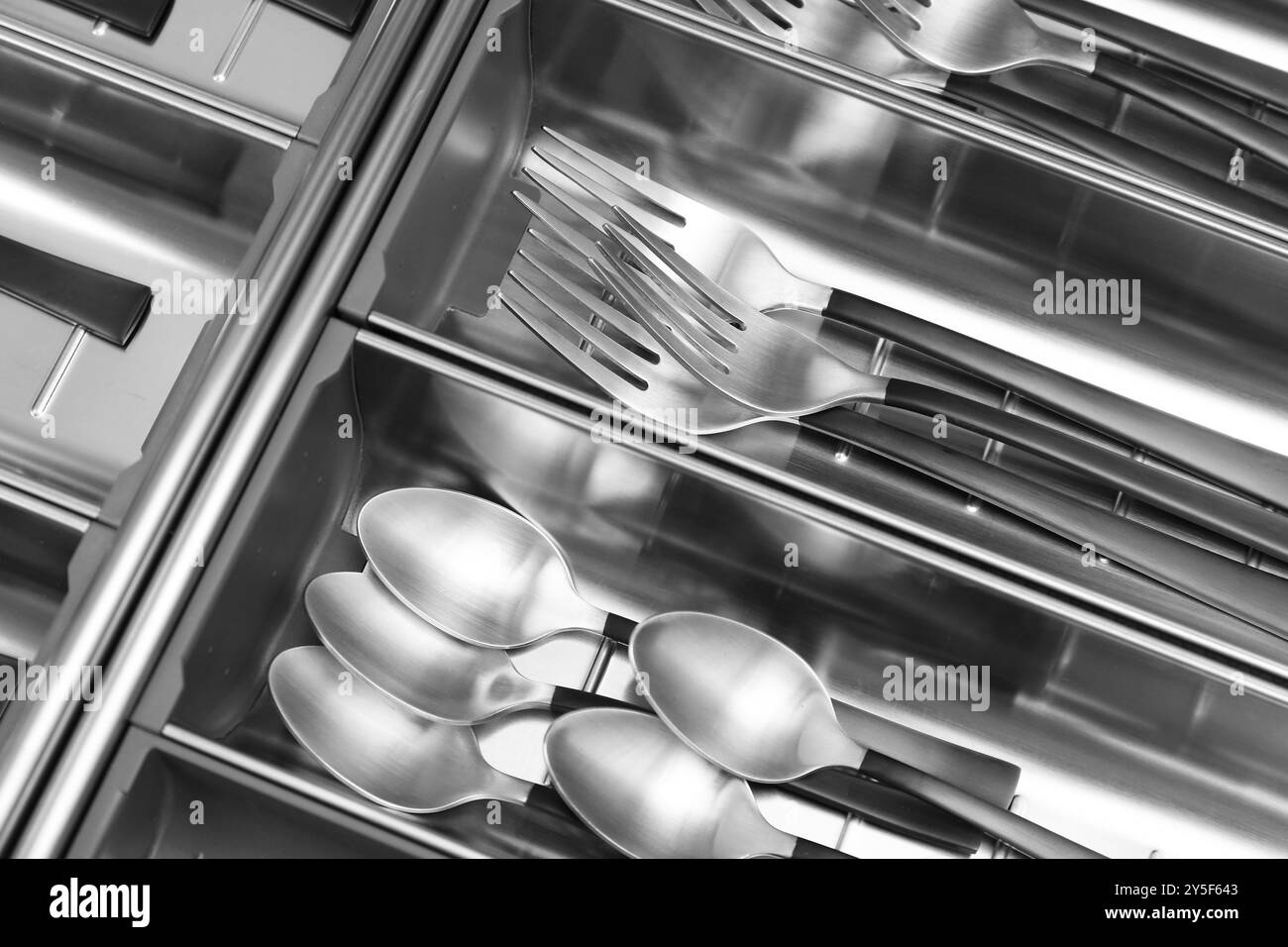 Box with cutlery in drawer, above view. Kitchen utensils storage Stock ...