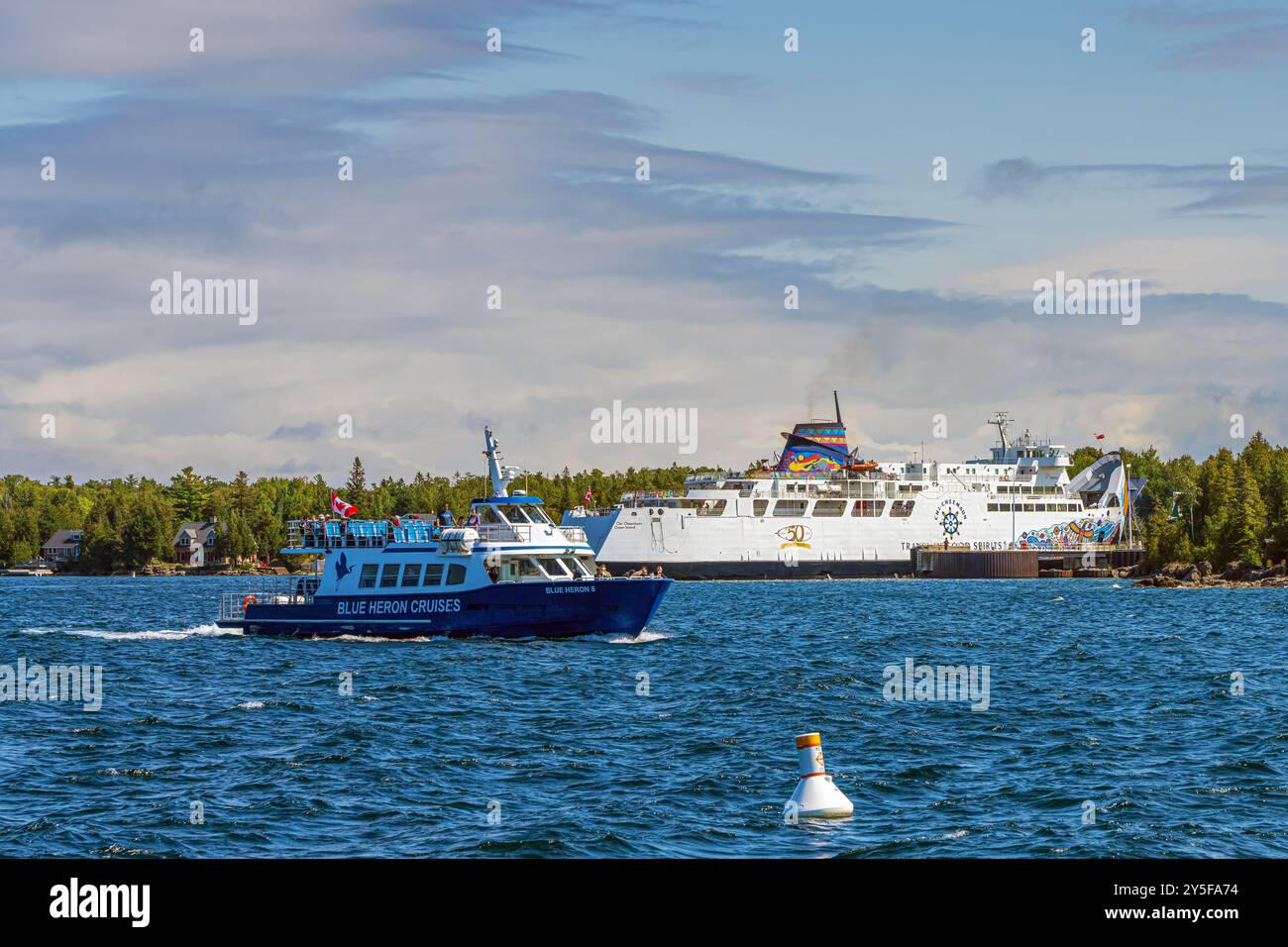 Boats in the water off Tobermory Ontario including a tour boat and the ...
