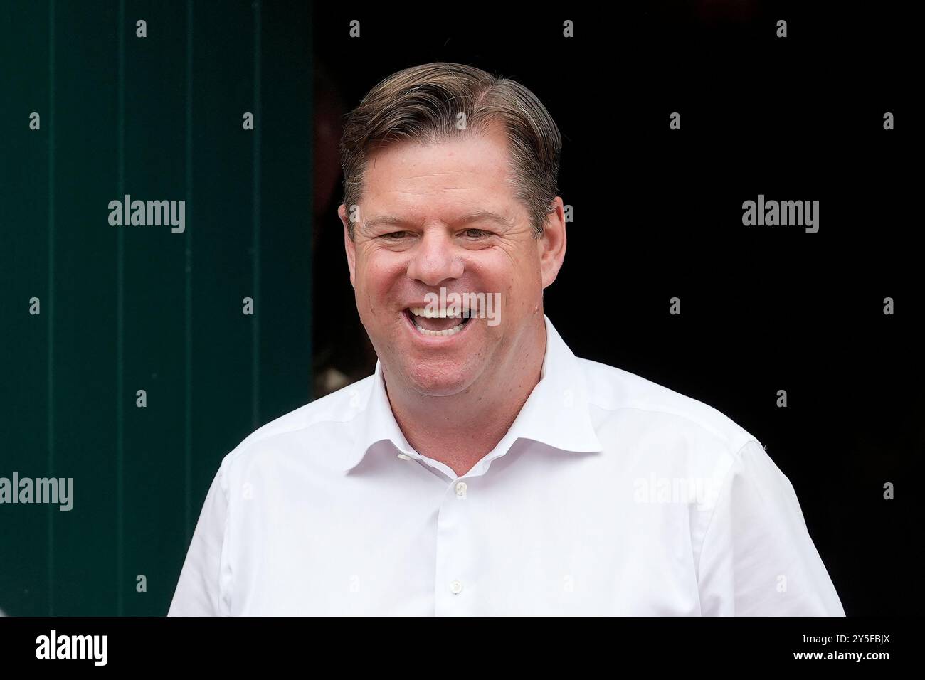 San Francisco mayoral candidate Mark Farrell smiles while meeting with ...