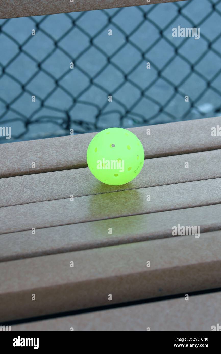 Pickleball on bench near Pickleball court in New York City Park in New ...