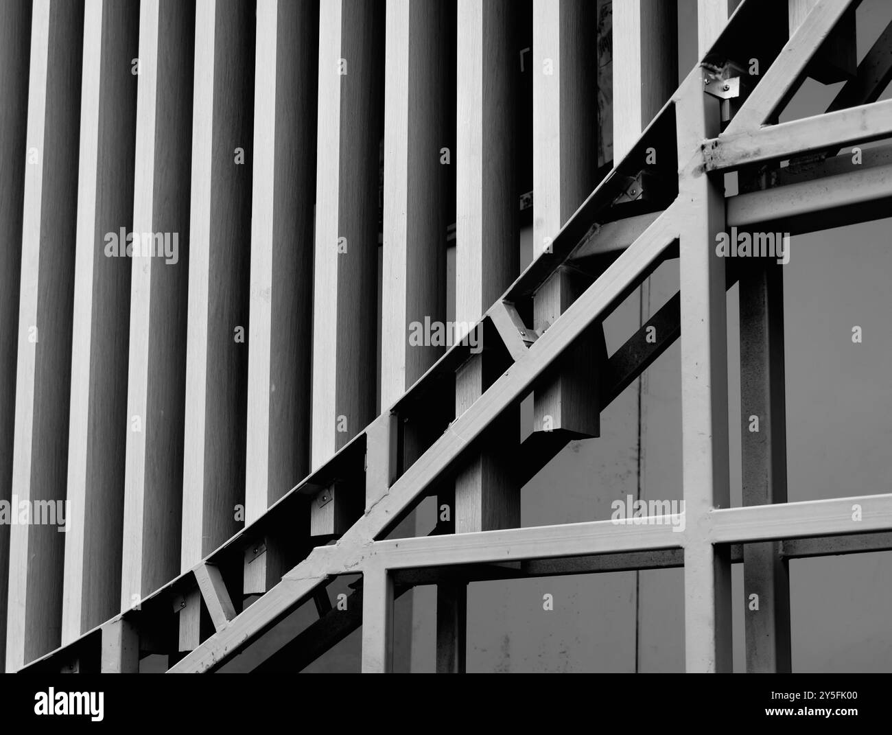 A structure featuring wooden slats on construction site contributing to ...