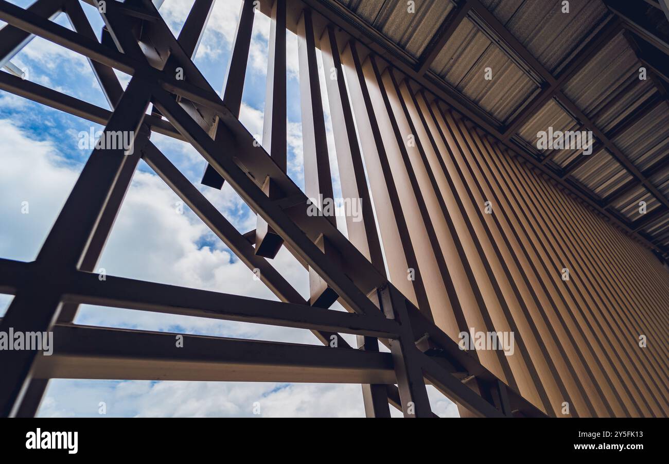 A structure featuring wooden slats on construction site contributing to ...