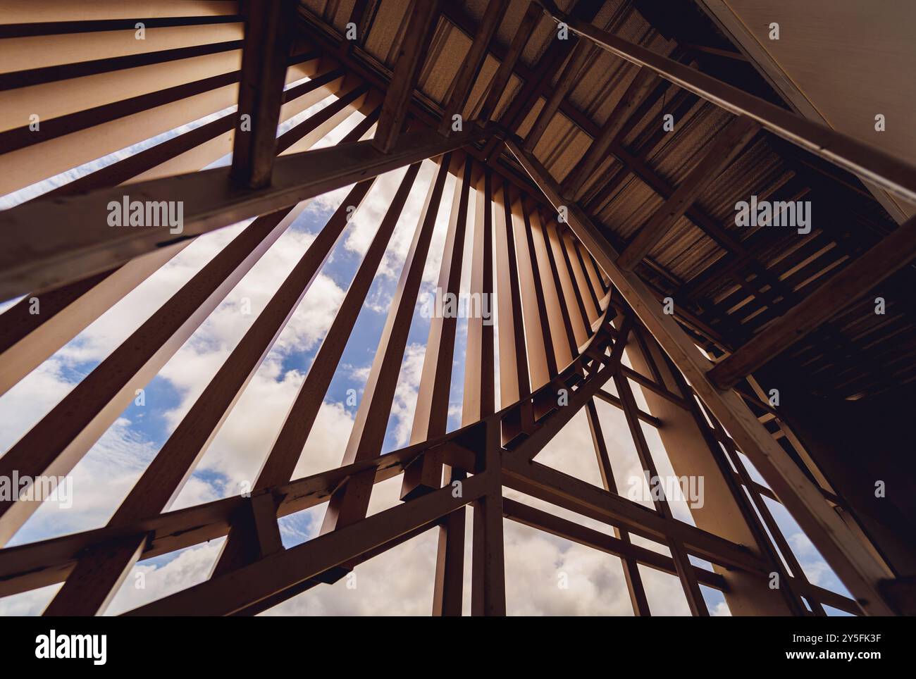 A structure featuring wooden slats on construction site contributing to ...