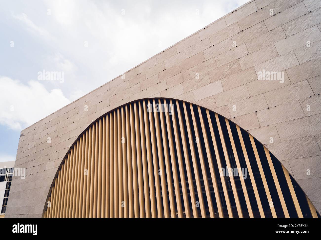 A structure featuring wooden slats on construction site contributing to ...