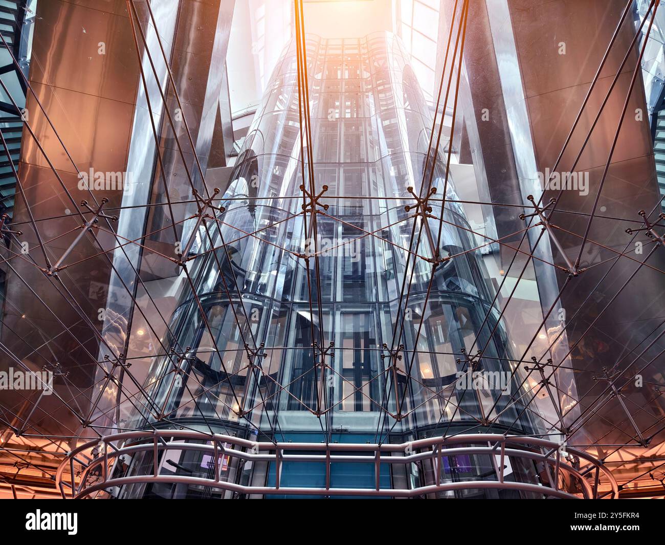 A modern tall building that features a significant amount of glass ...