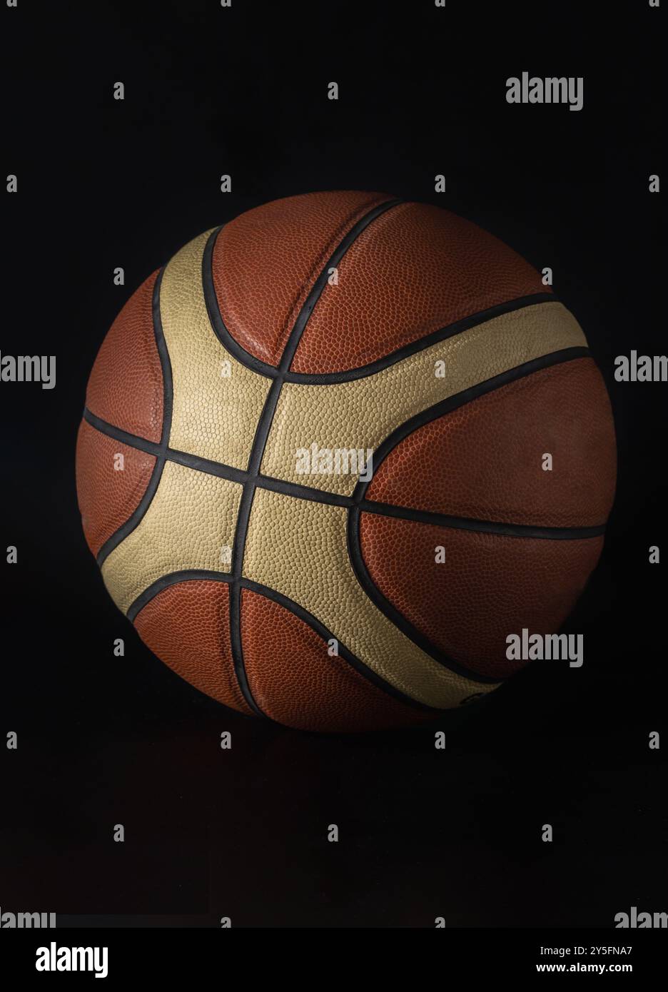 Basketball ball in minimalist style isolated on dark background ...