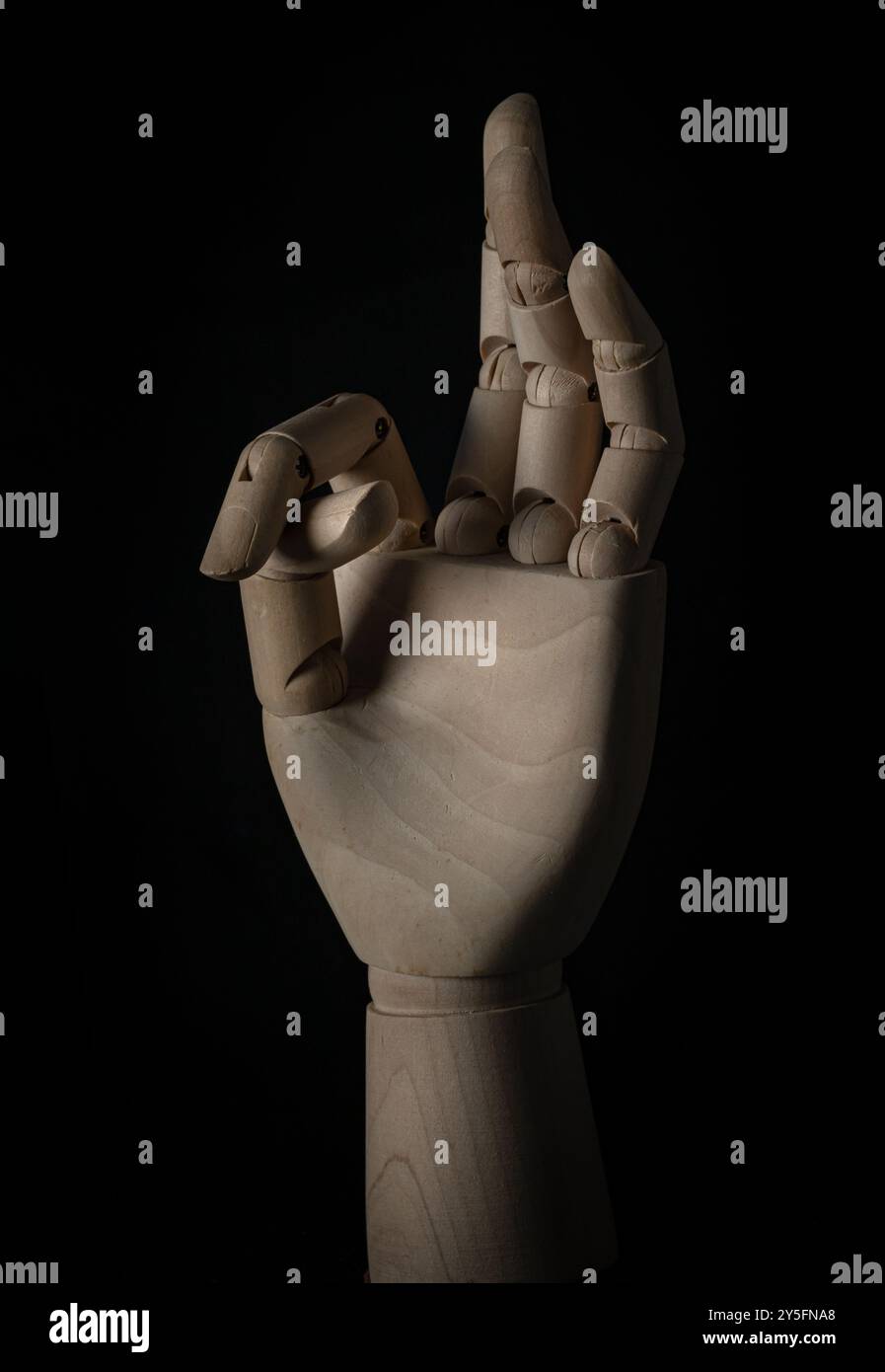 Wooden hand of mannequins showing OK gesture sign isolated on Black ...