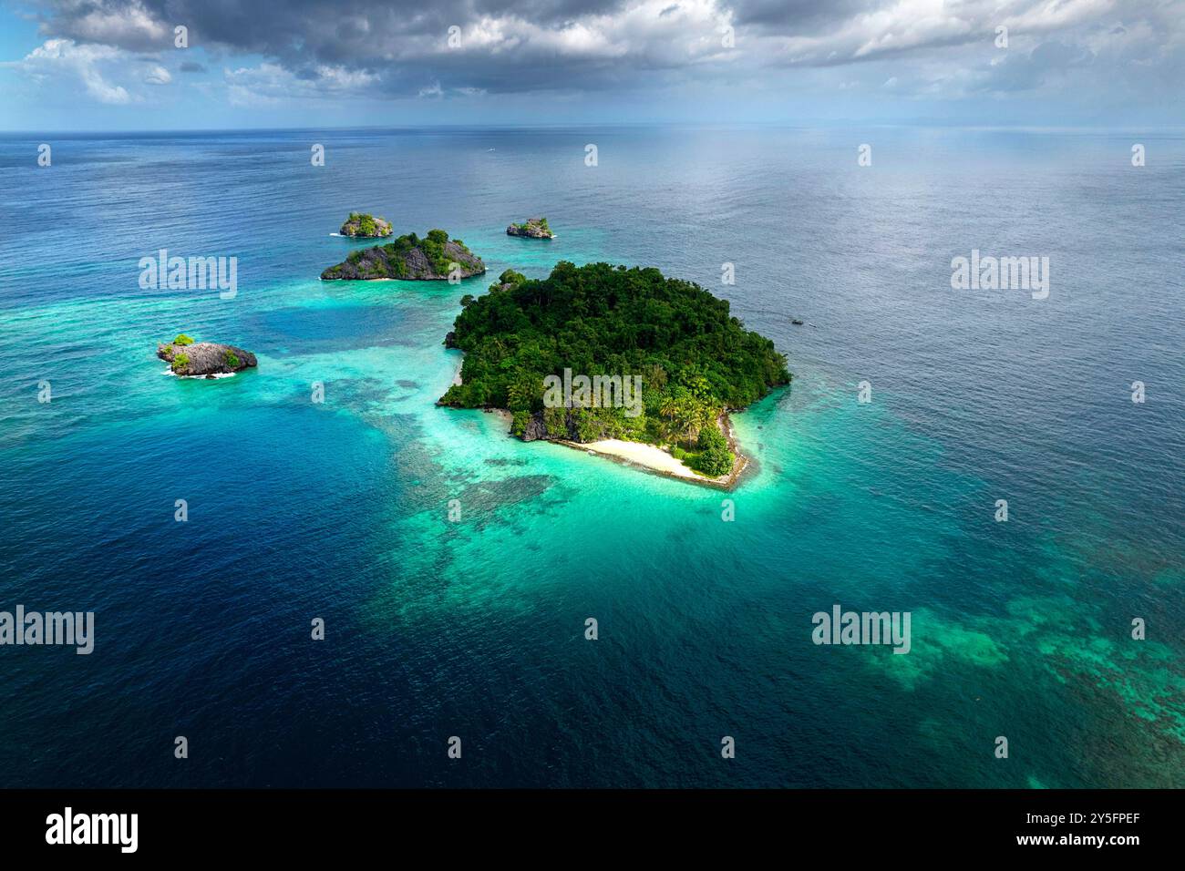 Aerial view of a beautiful tropical secluded island with beautiful ...