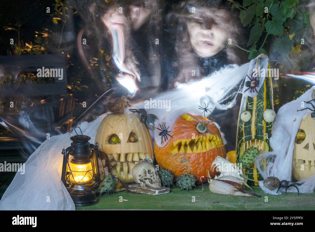 scary Jack O Lantern Halloween pumpkins in the dark, carved pumpkins ...