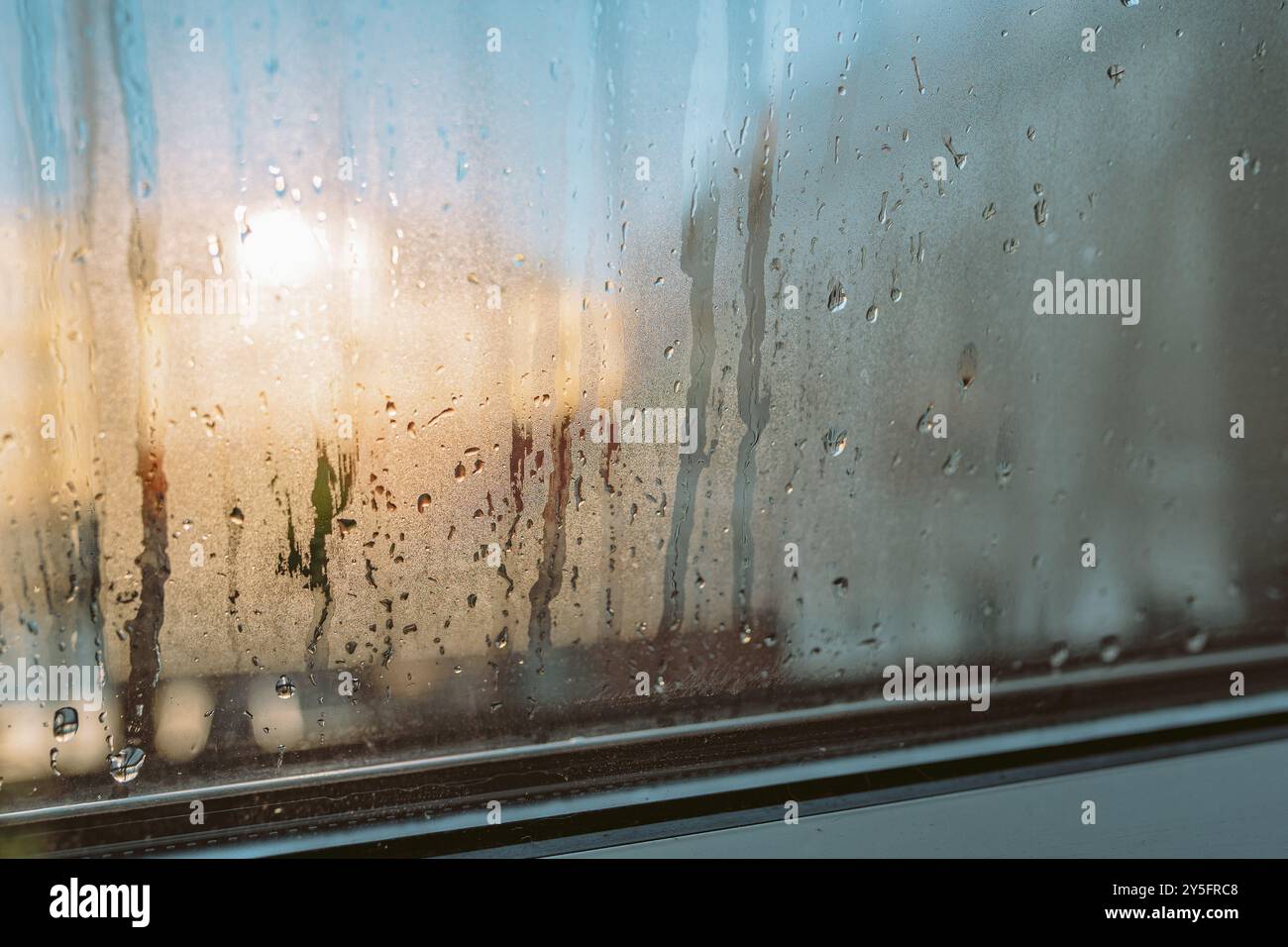 water droplets running on a double glazed window Stock Photo - Alamy