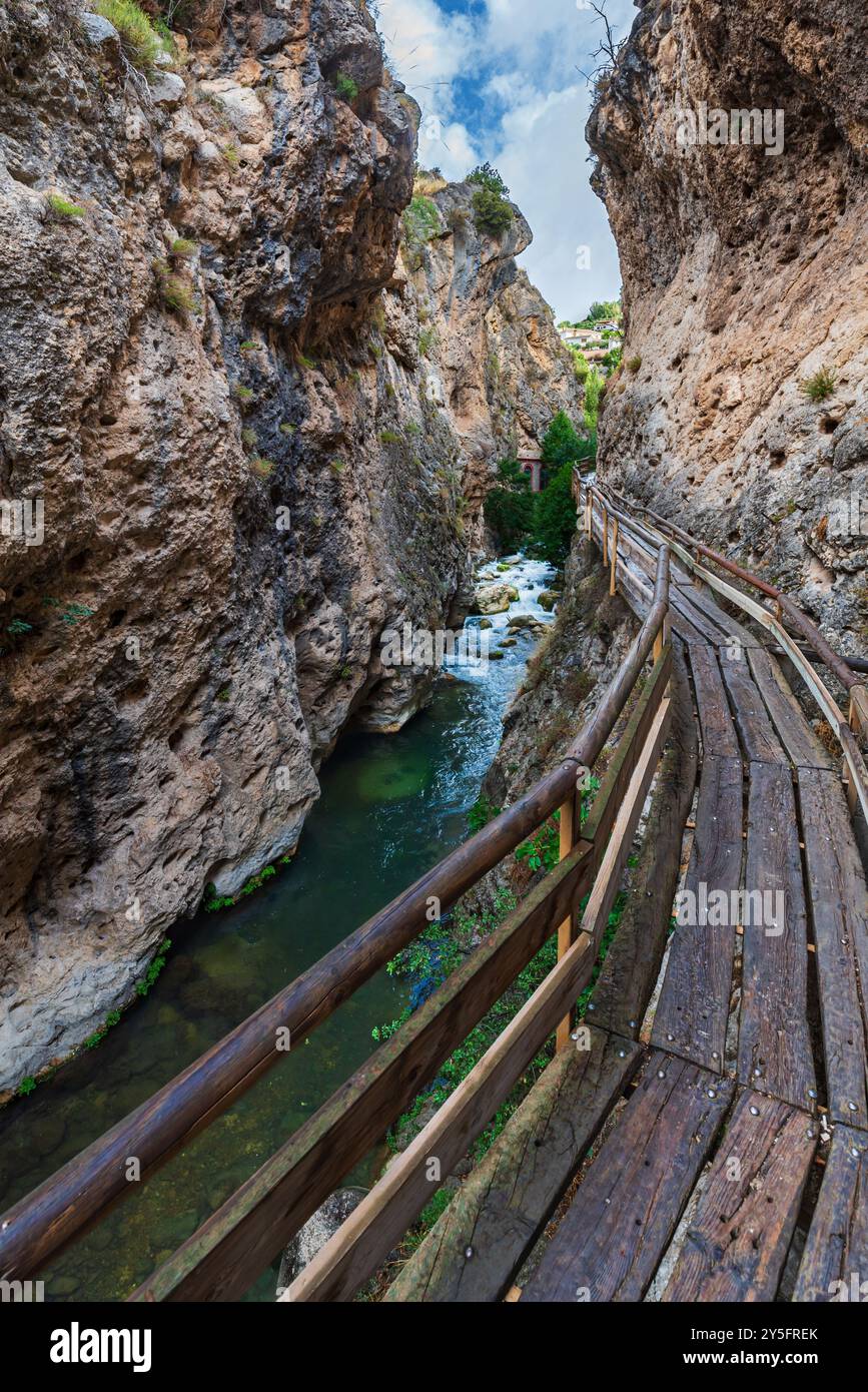 Wooden walkway located on the rock wall of the Castril River Gorge ...