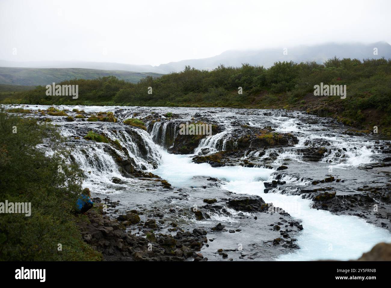 Bruarafoss waterfall Iceland. Waterfall with clear blue water Stock ...