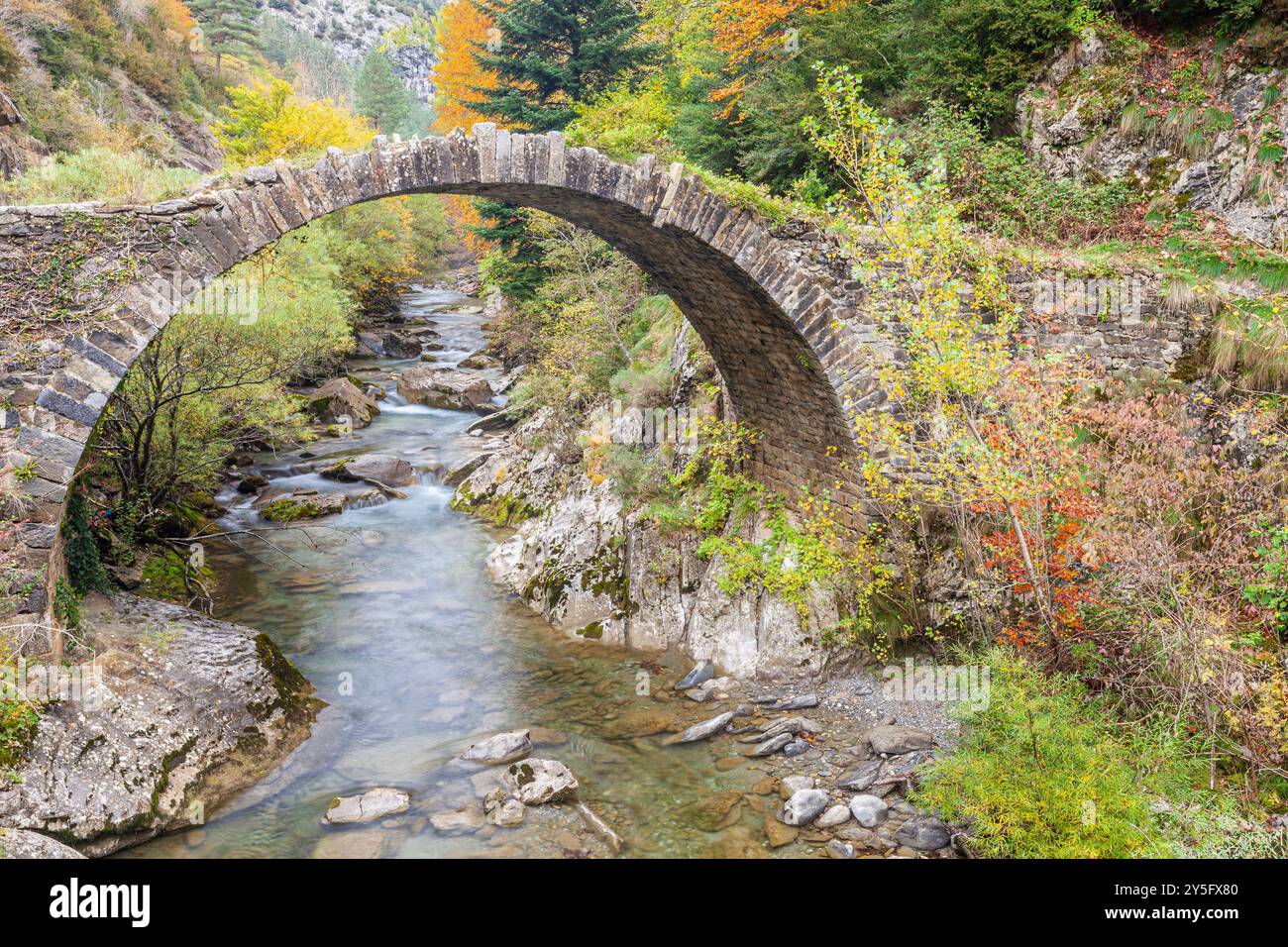 Romanesque bridge near Isaba in Belagua River, Roncal Valley, Navarra ...