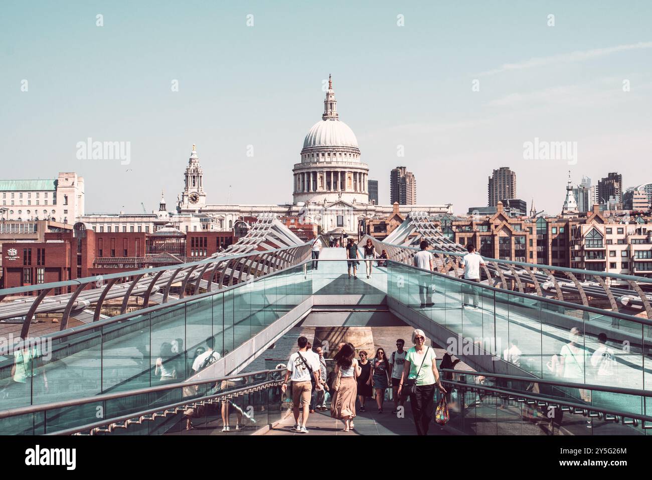 The Millenium bridge and St Paul's Cathedral, London in a sunny day ...