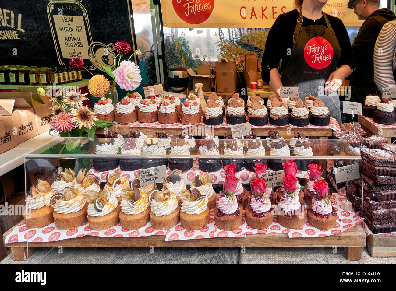 Fancy cakes on sale at a street food festival. England UK Stock Photo ...