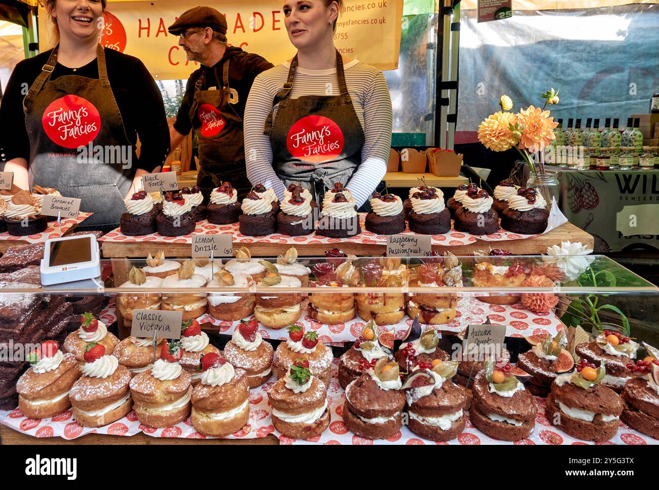 Fancy cakes on sale at a street food festival. England UK Stock Photo ...