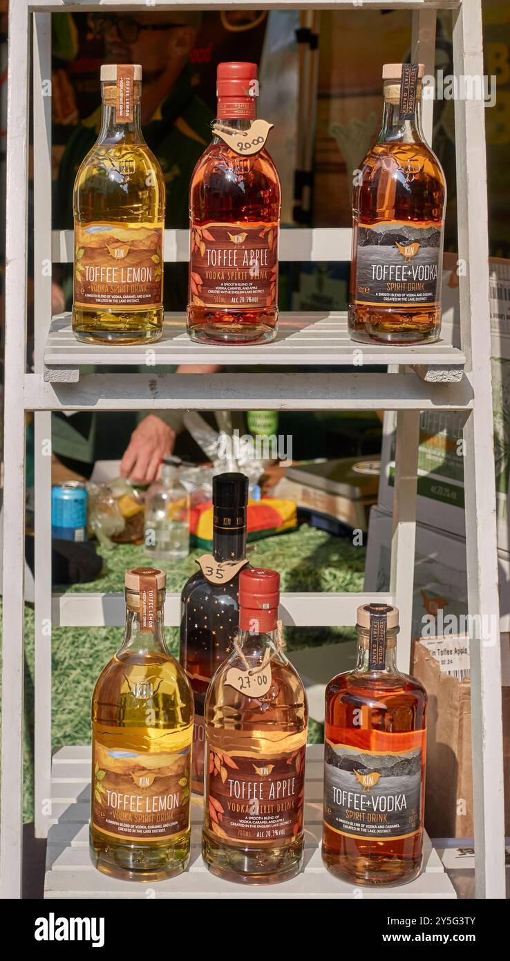 Vodka spirit bottles in various fruit flavours for sale at a street ...