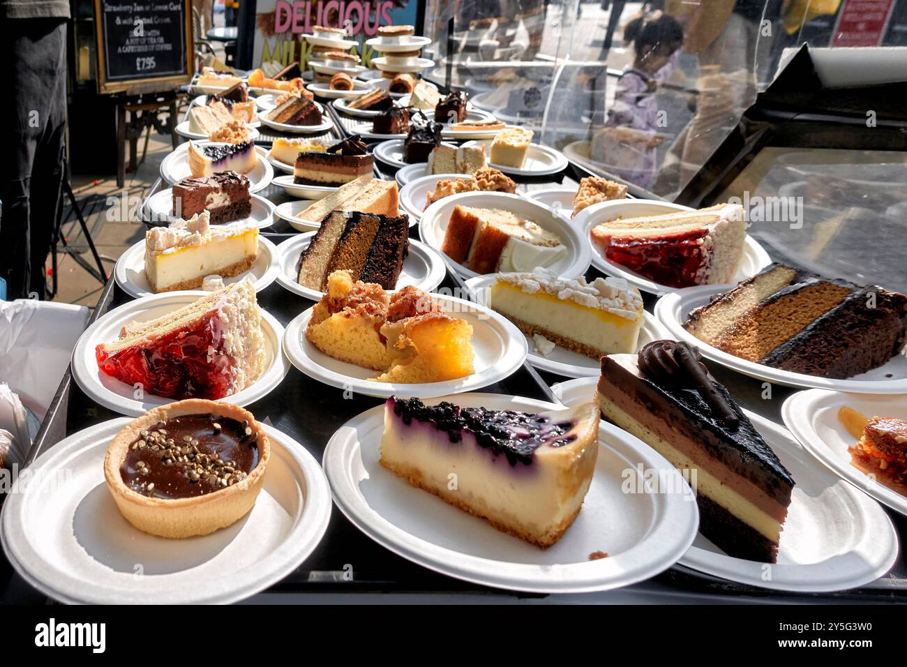 Fancy cakes on sale at a street food festival. England, UK Stock Photo ...
