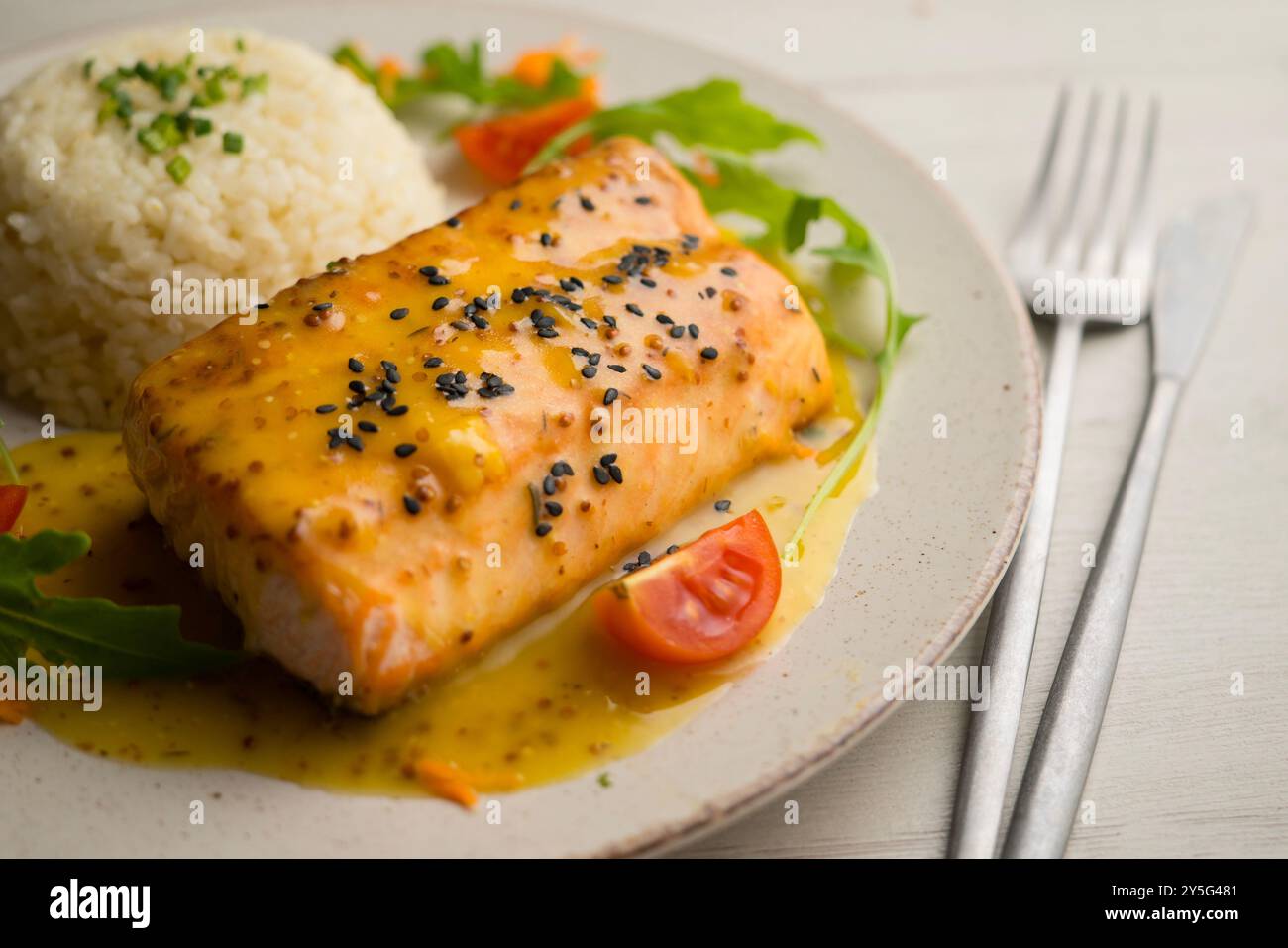 Baked salmon with orange sauce. Top view table with decoration Stock ...