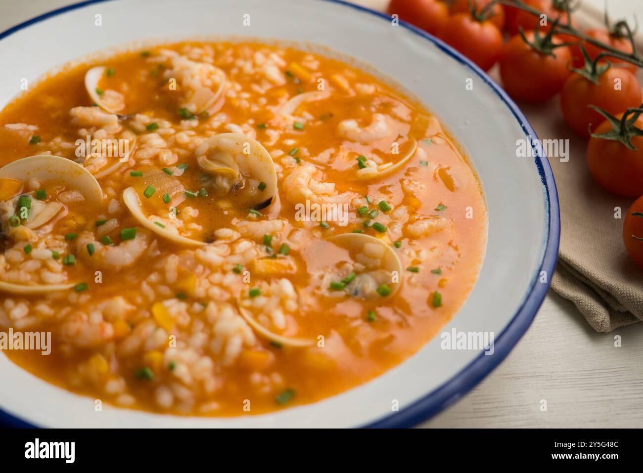Rice soup with shrimp and clams. Top view table with decoration Stock ...