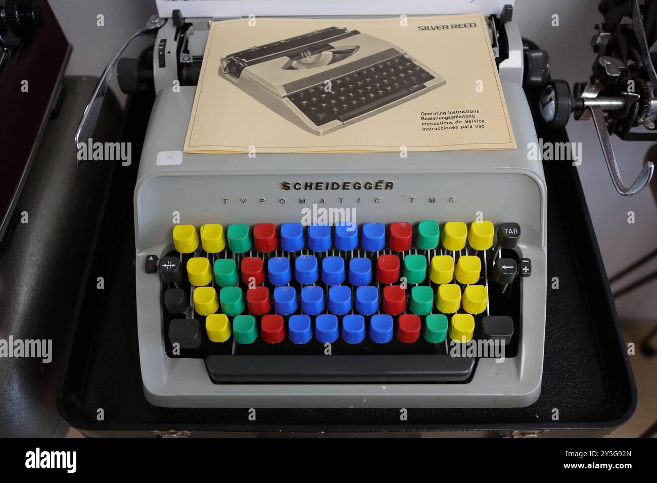 Colourful keys on a typewriter traditional manual typewriter typing ...