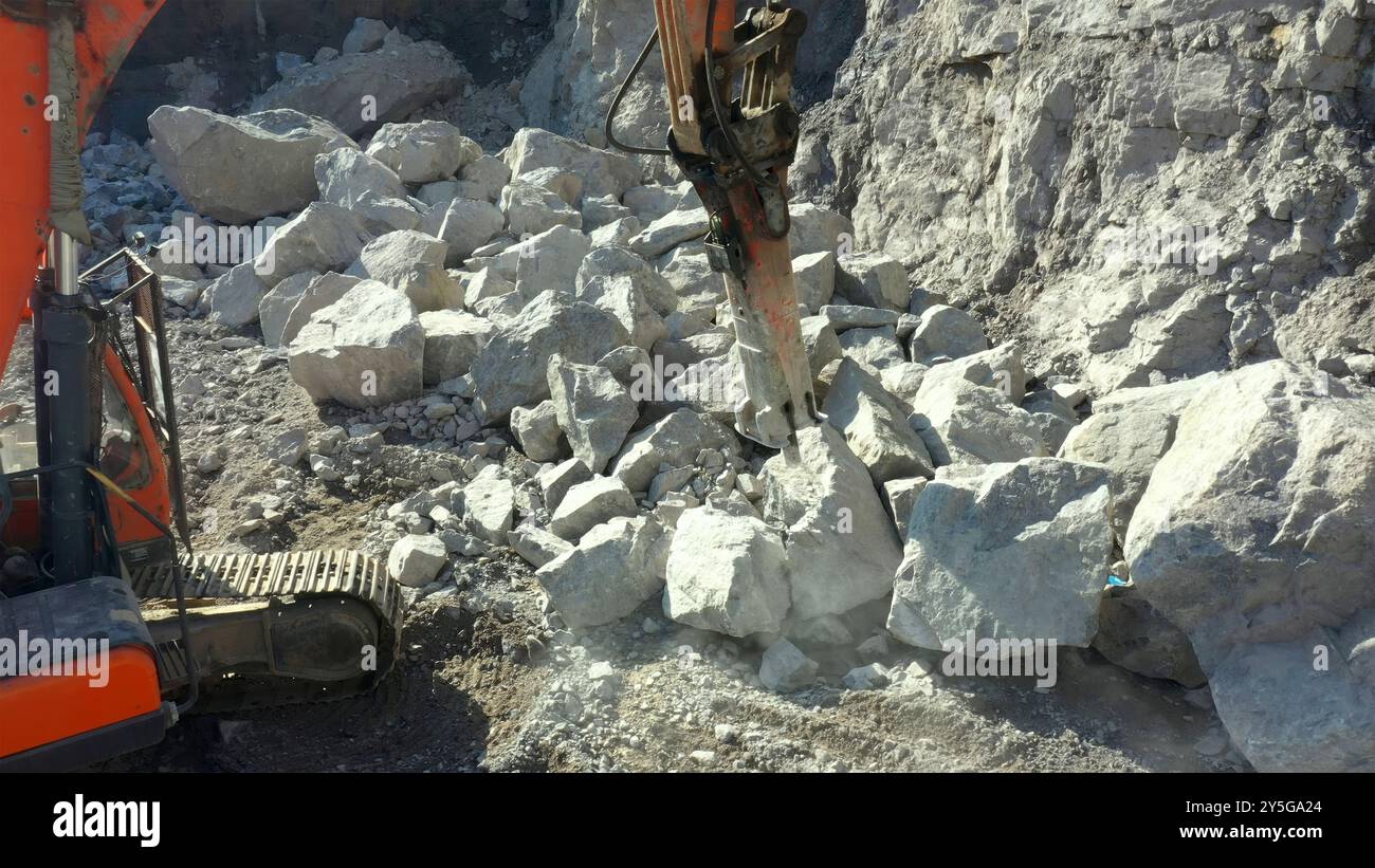 Open cast mine. Extraction of granite. Stone Quarrying Stock Photo - Alamy