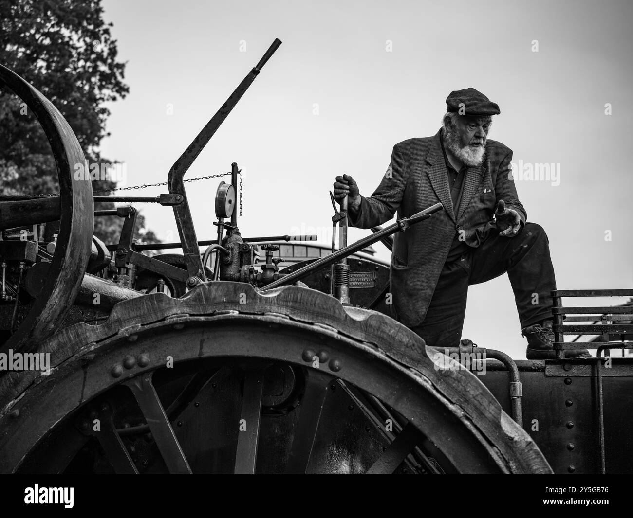 PORTRAIT OF STEAM ENGINE OWNER STANDING ON HIS STEAM ENGINE SAINT ...