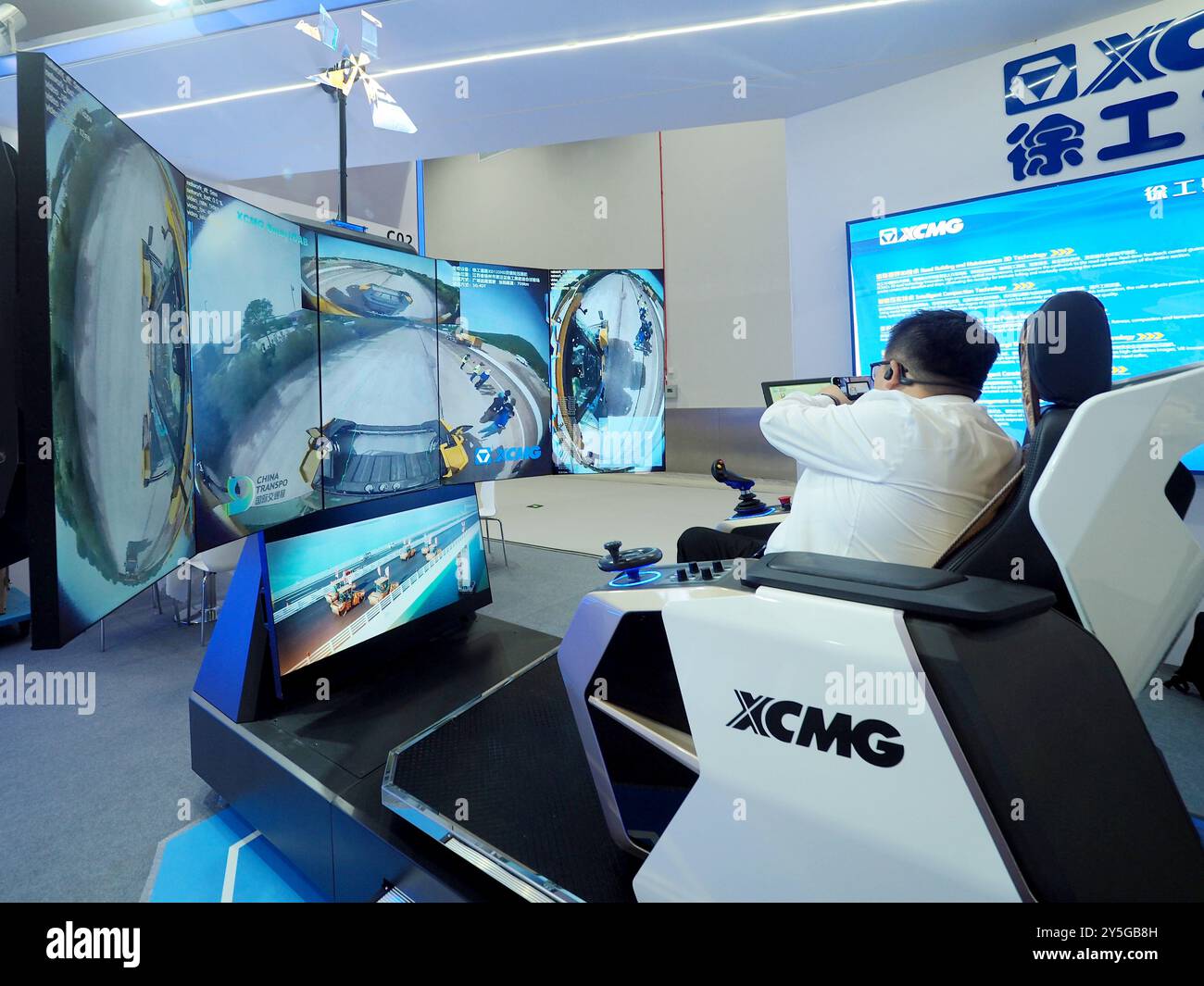 BEIJING, CHINA - SEPTEMBER 22, 2024 - Visitors experience the "5G smart ...