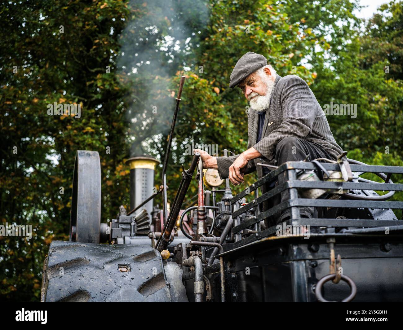 PORTRAIT OF STEAM ENGINE OWNER STANDING ON HIS STEAM ENGINE SAINT ...