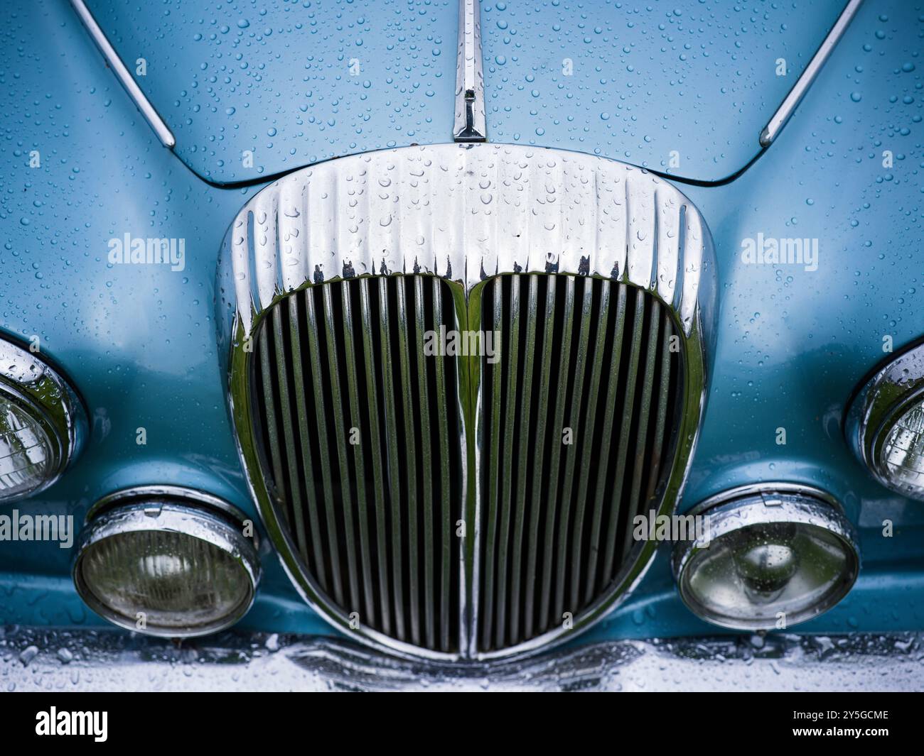 BONNET AND GRILL OF CLASSIC CAR WITH RAIN DROPS SAINT MAWGAN VINTAGE ...