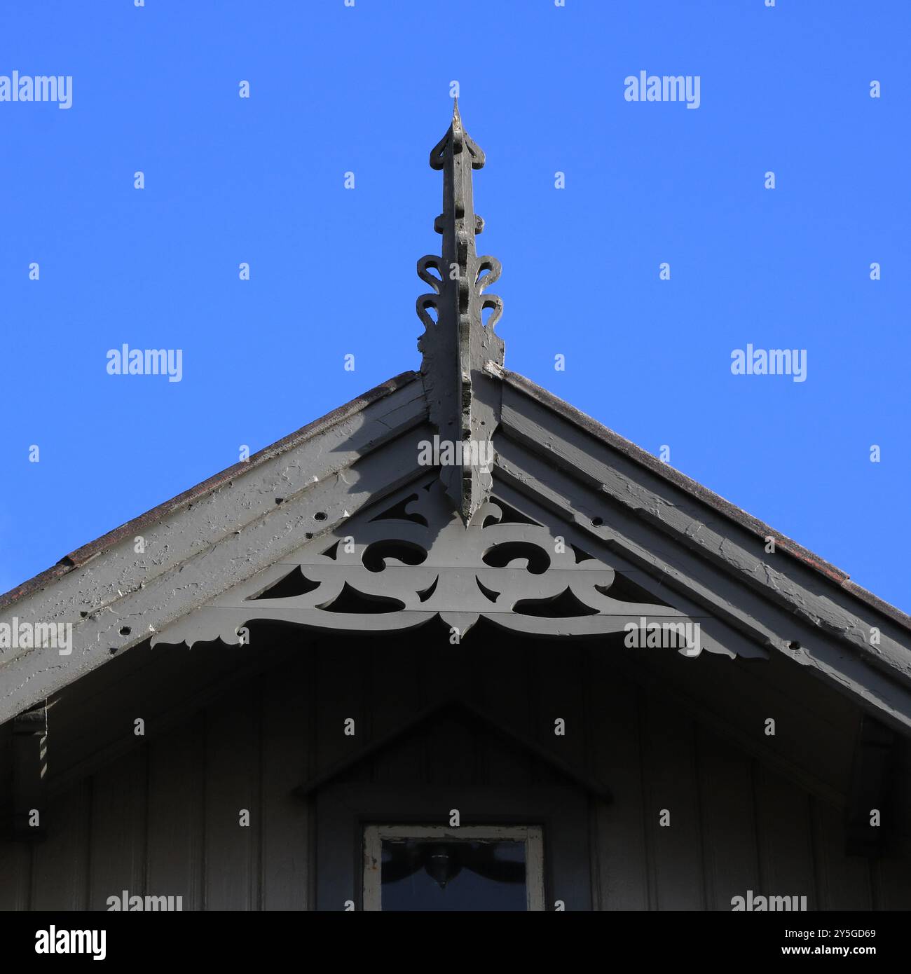 Grey gable of a old timber house in Egersund with beautiful ornaments ...