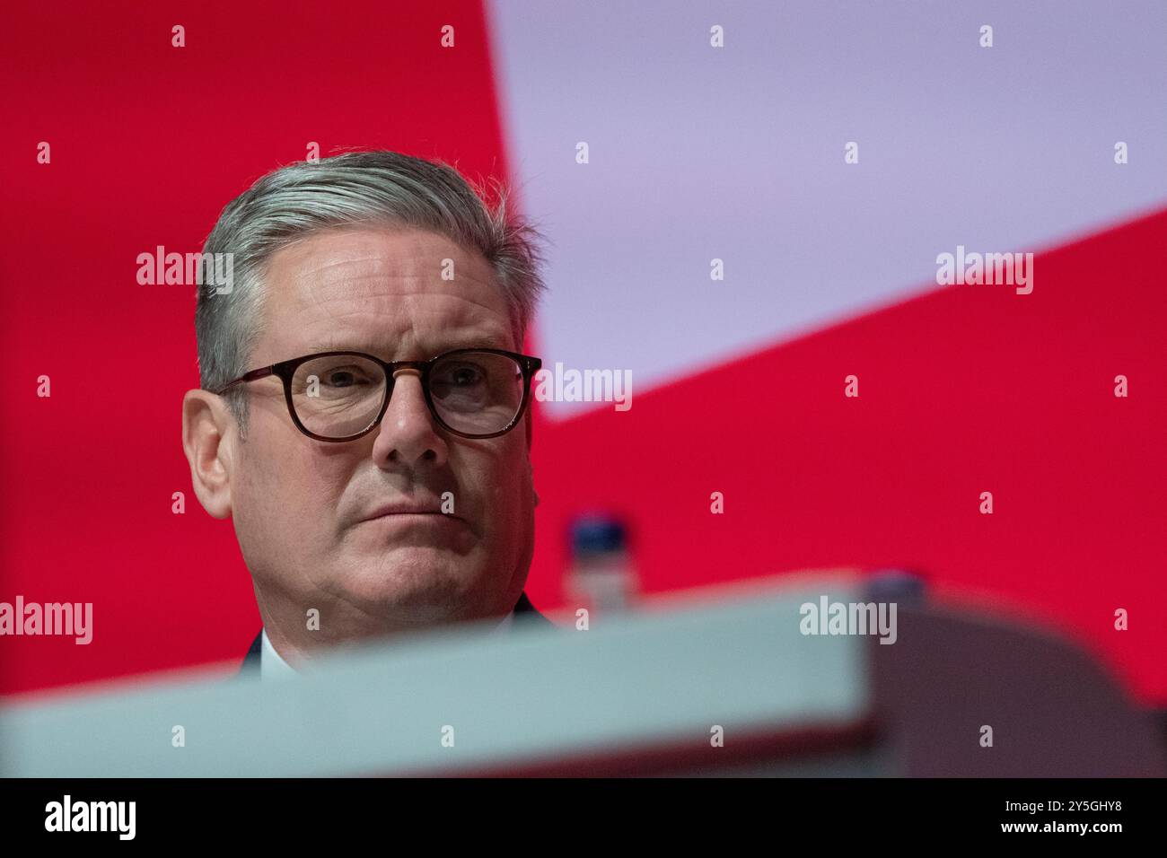 Liverpool, UK. 22nd Sep 2024. PM Keir Starmer listens, then applauds ...