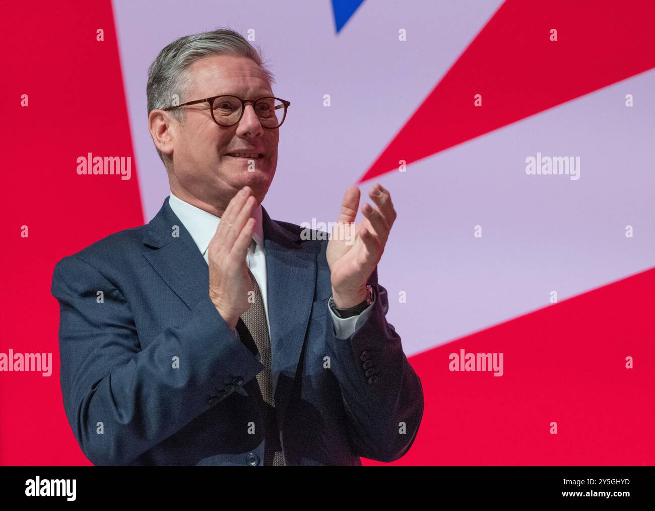 Liverpool, UK. 22nd Sep 2024. PM Keir Starmer listens, then applauds ...