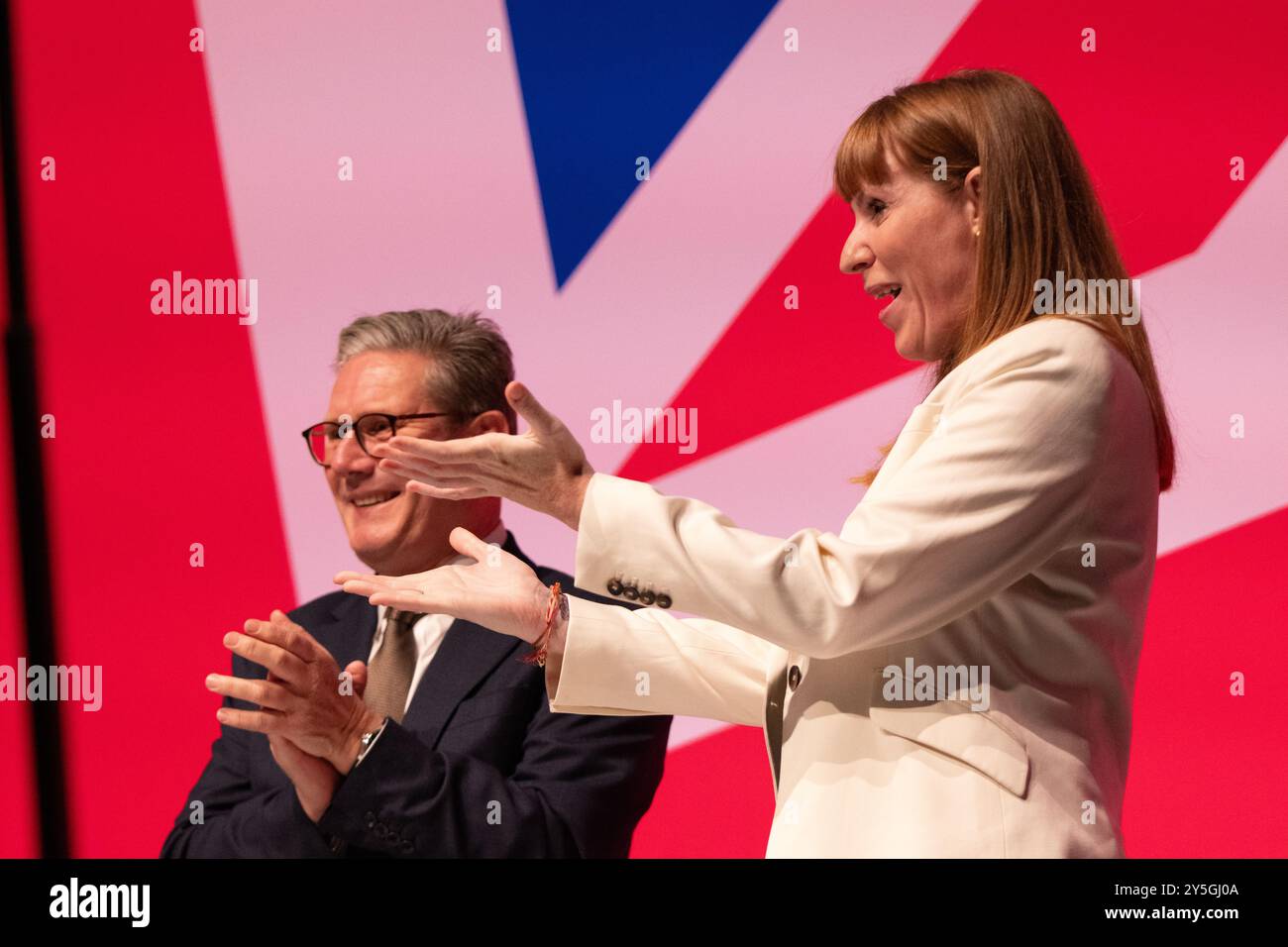 Liverpool, UK. 22nd Sep 2024. PM Keir Starmer listens, then applauds ...