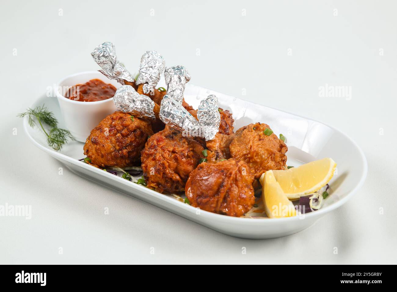 Chicken lollipop is Indian Chinese appetizer which is a frenched ...