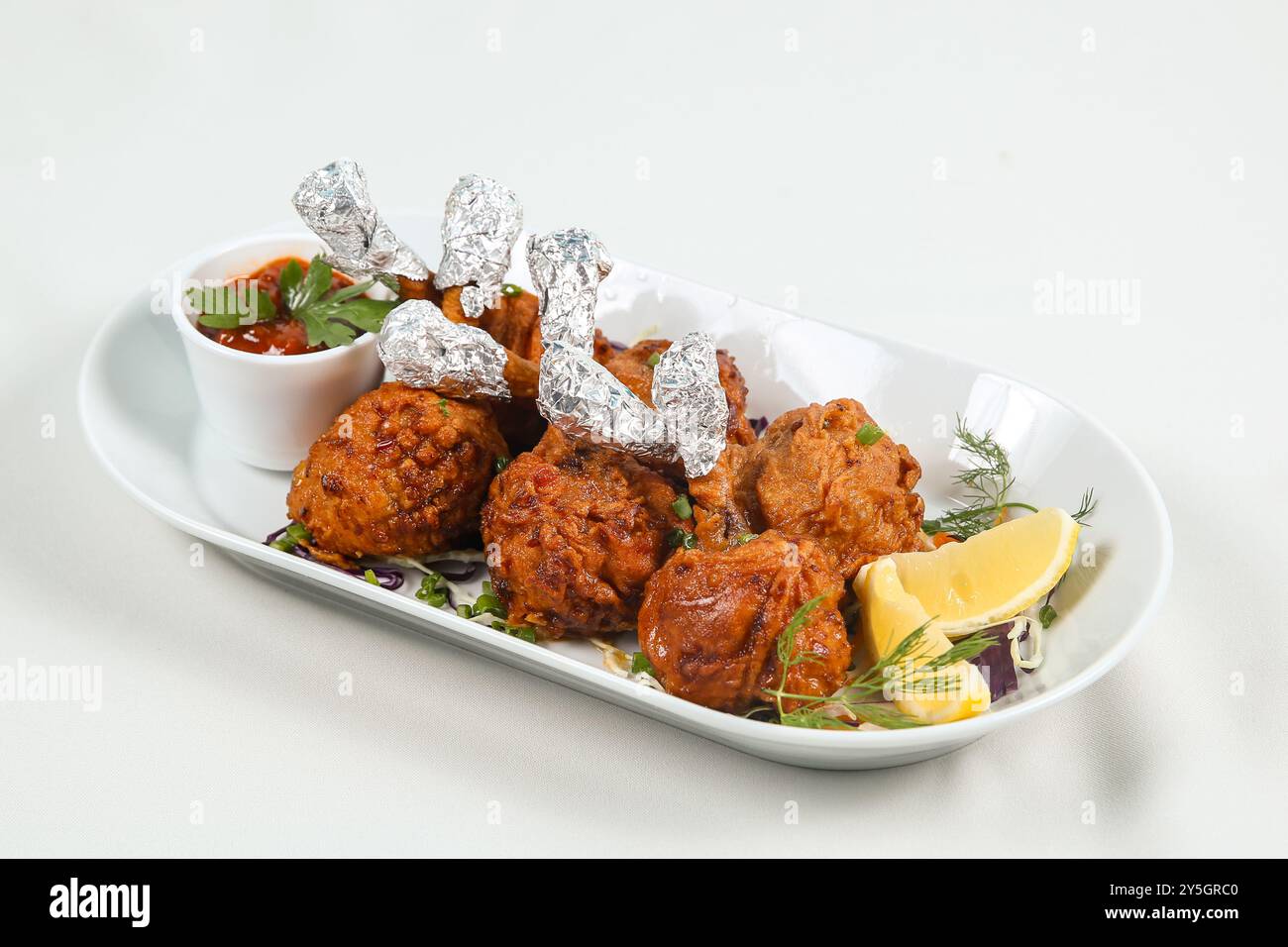 Chicken lollipop is Indian Chinese appetizer which is a frenched ...