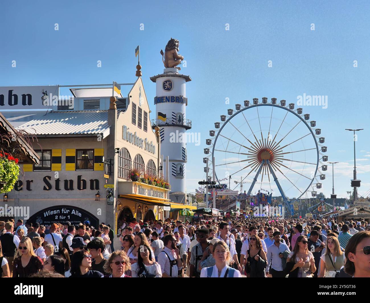 MUNICH, GERMANY - SEPTEMBER 21: Crowd of people in traditional clothes ...