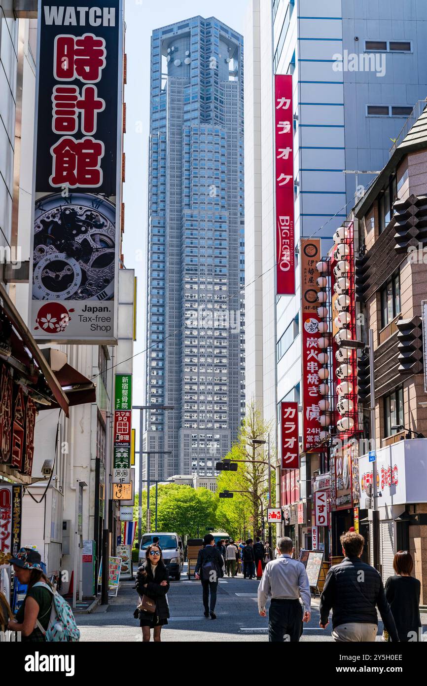 View along Chuo dori, a narrow shopping street in Shinjuku with the ...