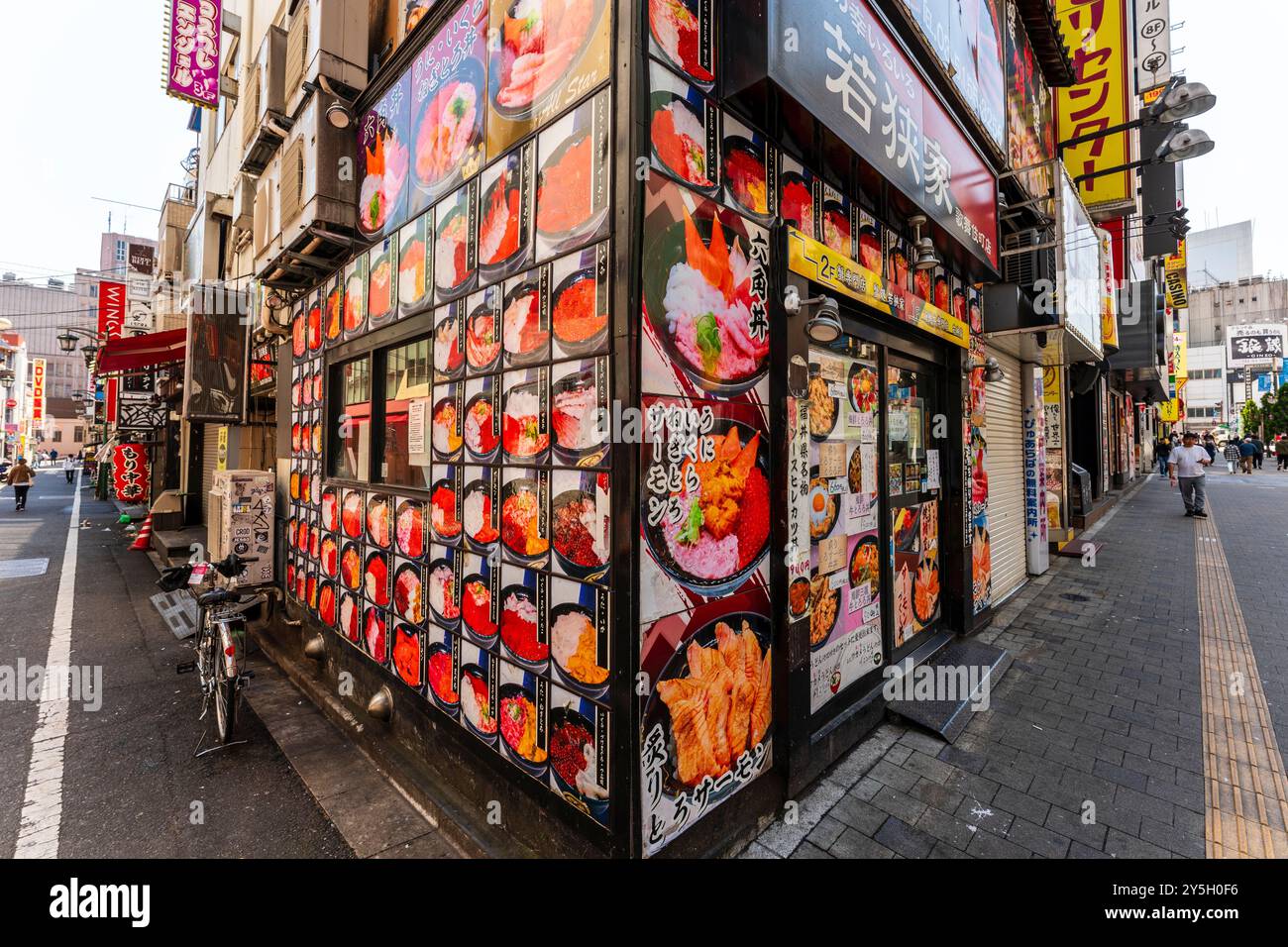 Corner building housing a seafood restaurant with the entire walls on ...