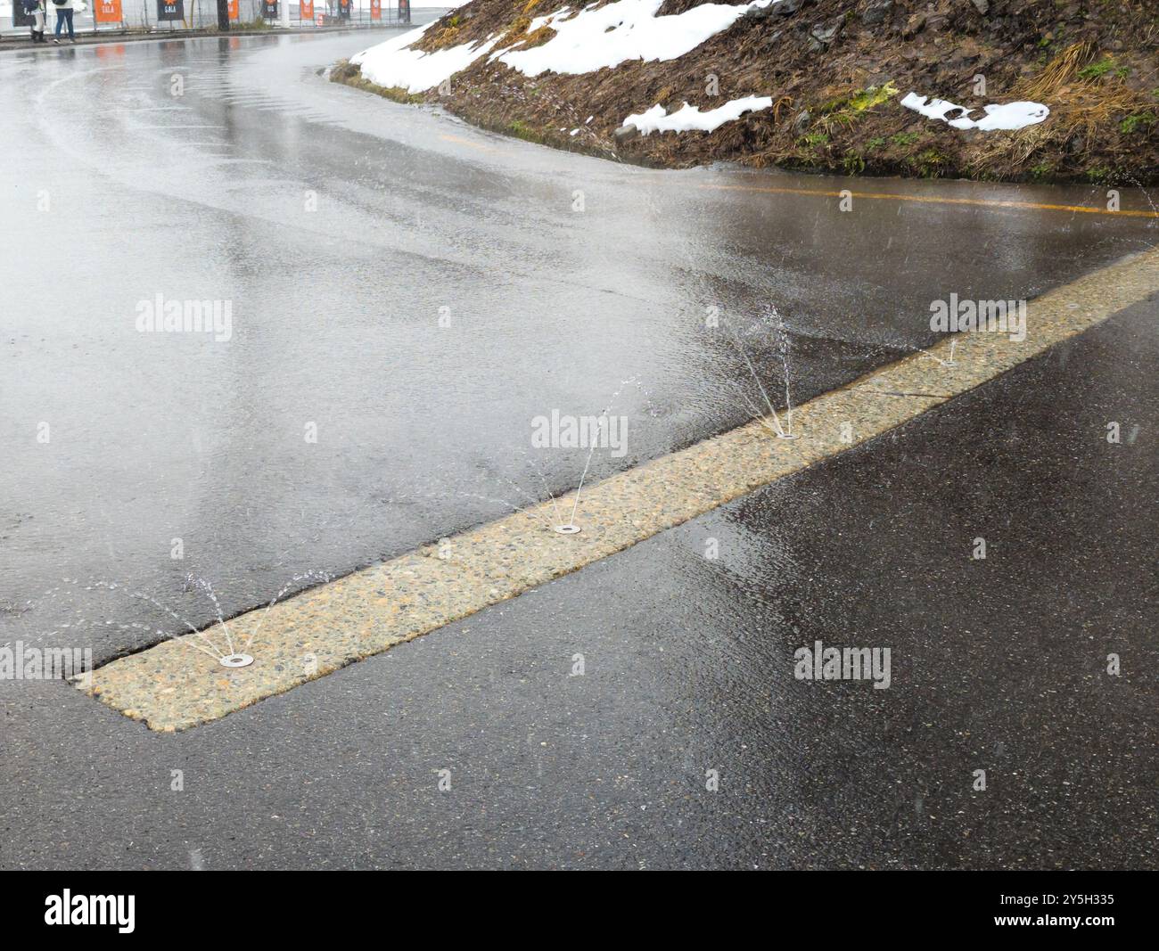 Volcanic hot spring water pumped onto a road to prevent snow and ice ...