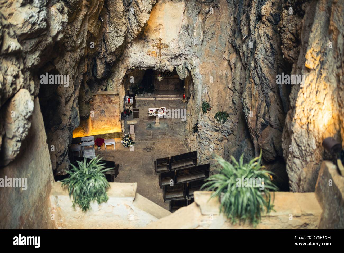 ancient Catholic church located in a natural cave Stock Photo - Alamy