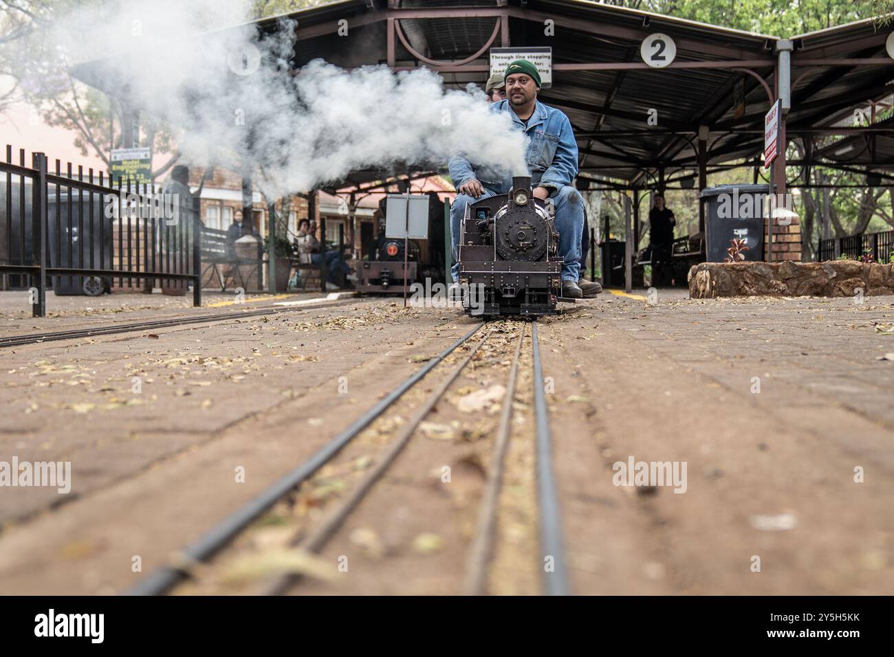 Gauteng, South Africa. 22nd Sep, 2024. People ride on a miniature train ...