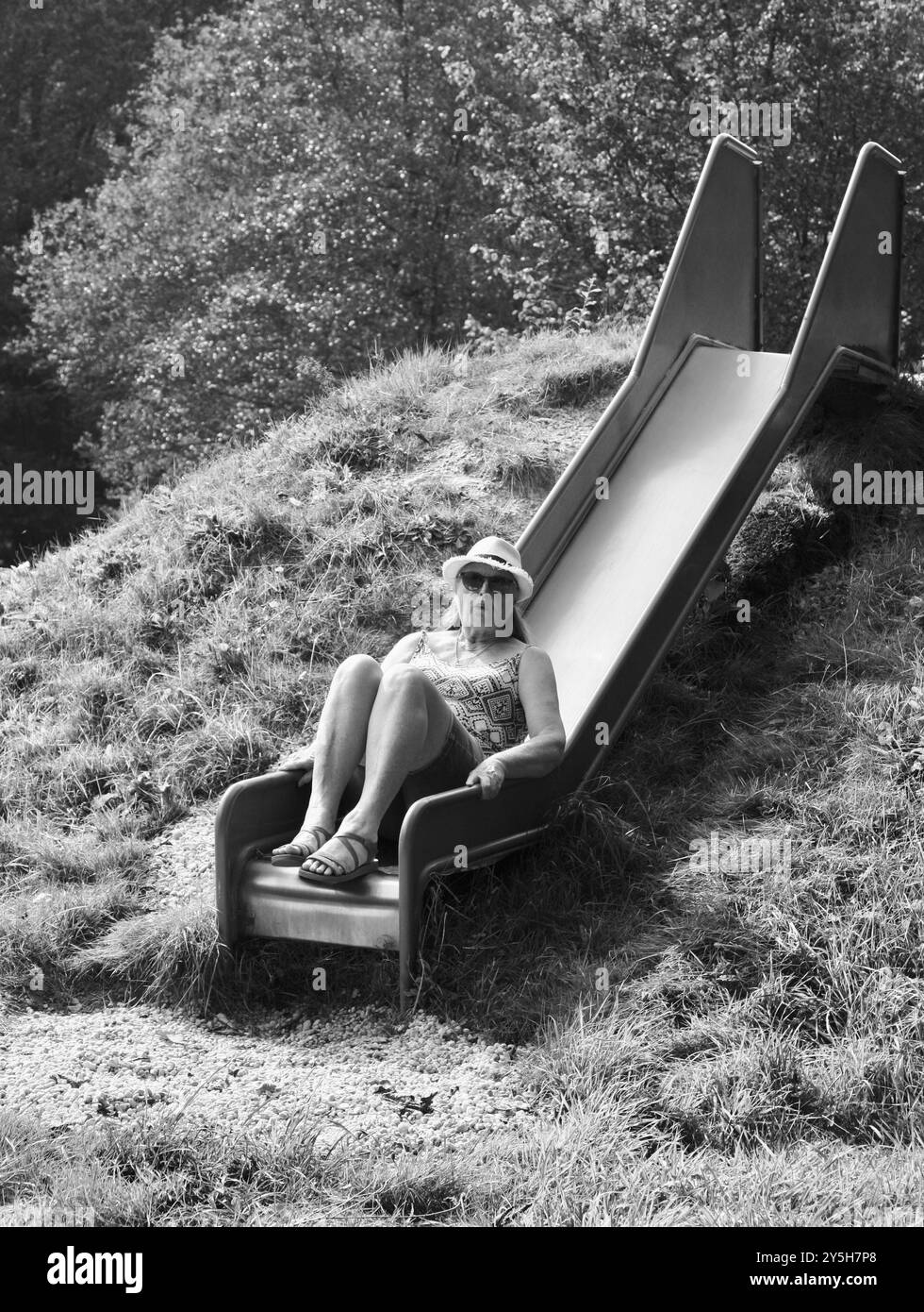 Old slide on playground in Black and White Stock Photos & Images - Alamy
