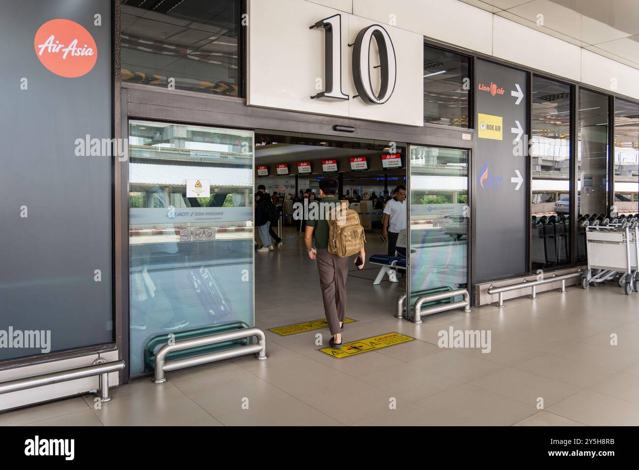 A passenger is seen entering in Don Mueang International Airport. Don ...