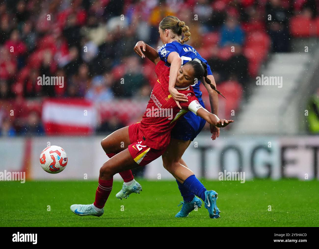 Liverpool's Taylor Hinds (left) is challenged by Leicester City's Ruby ...