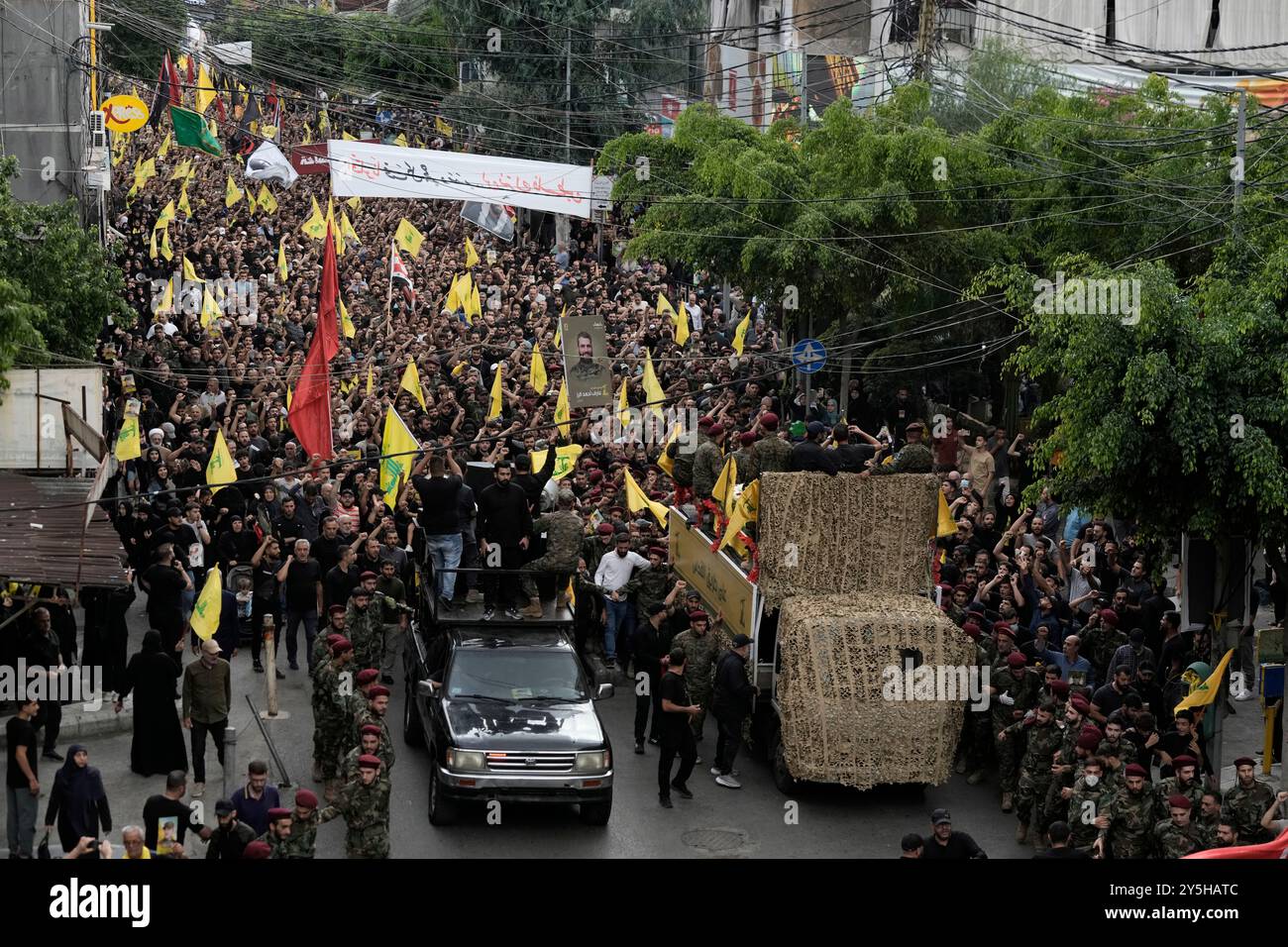 Hezbollah supporters attend the funeral procession of Hezbollah ...