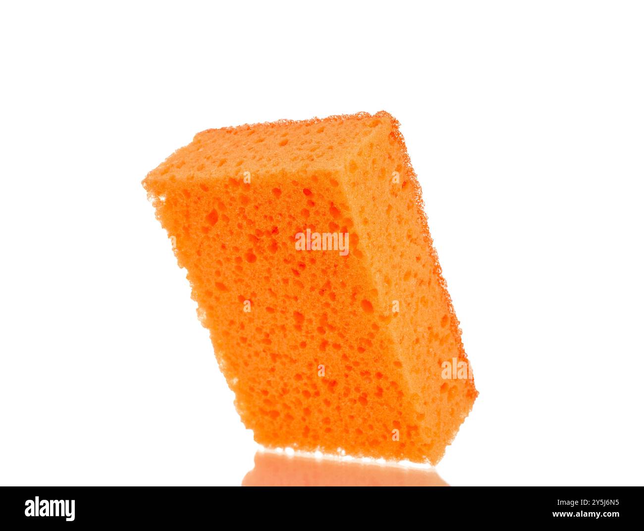 One kitchen sponge, macro, isolated on white background Stock Photo - Alamy