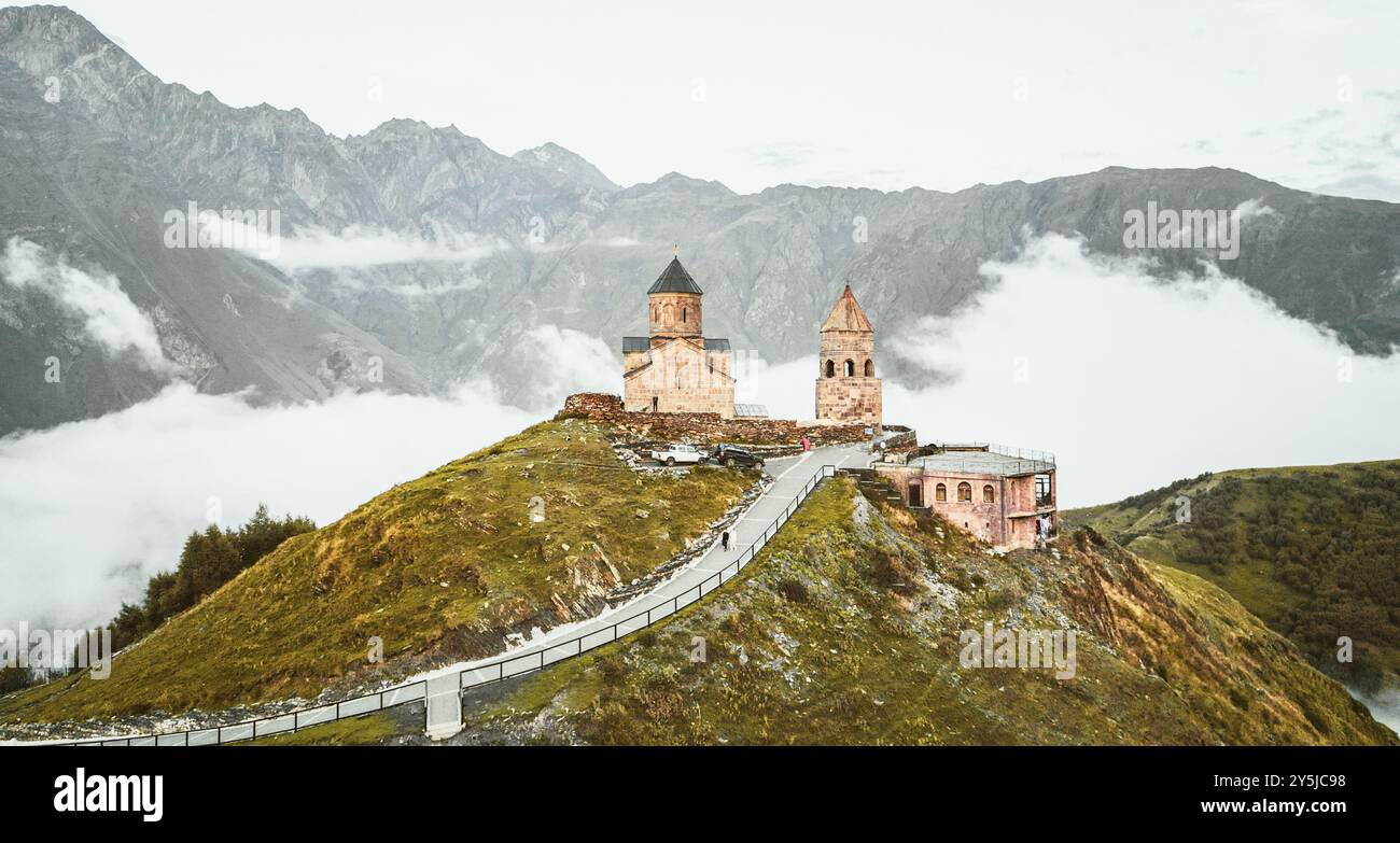 Aerial view Gergeti trinity church after sunset, Georgia. Stepanstminda ...
