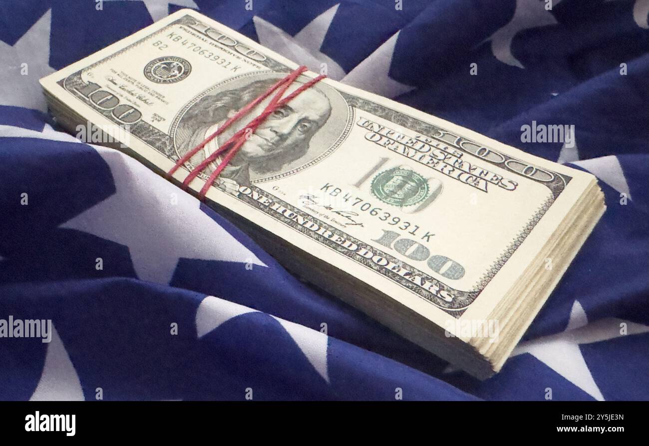 One hundred dollars banknotes on flag background Stock Photo - Alamy